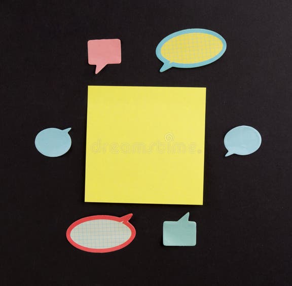 Brainstorming and Idea Concept. Big Yellow Sticky Note Surrounded by ...