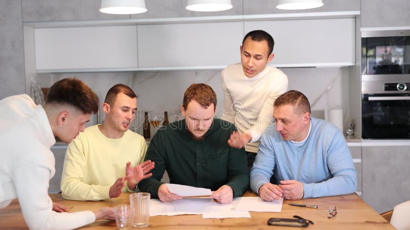 Friends Reading Financial Documents and Trying To Solve Problems ...