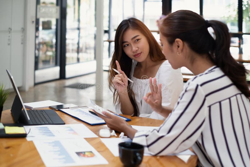 Brainstorming at Office Briefing Concept. Group of Business Woman ...
