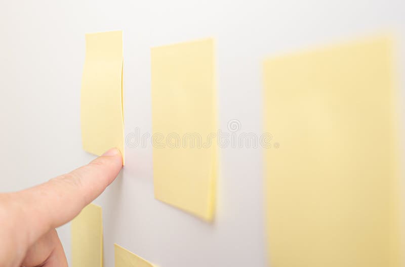 Brainstorming for Strategy Plan. Finger Points To an Important Note ...