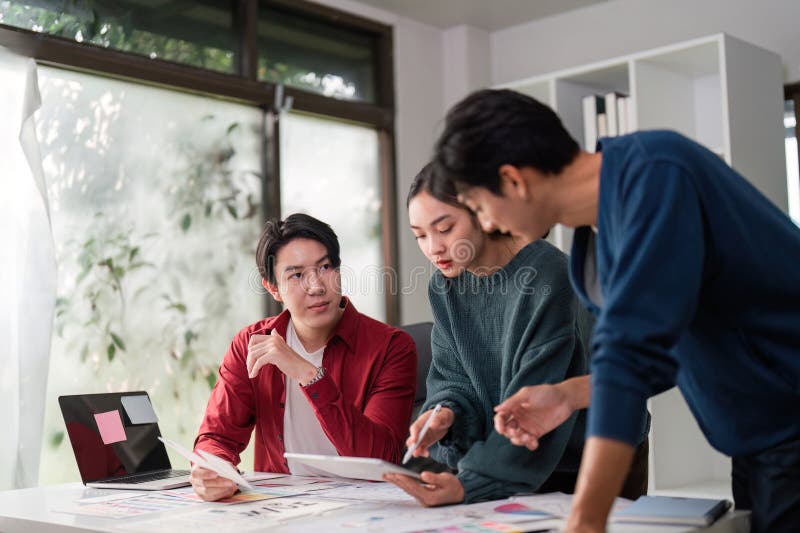 Brainstorming and UIUX Design. a Creative Team Collaborates on User ...