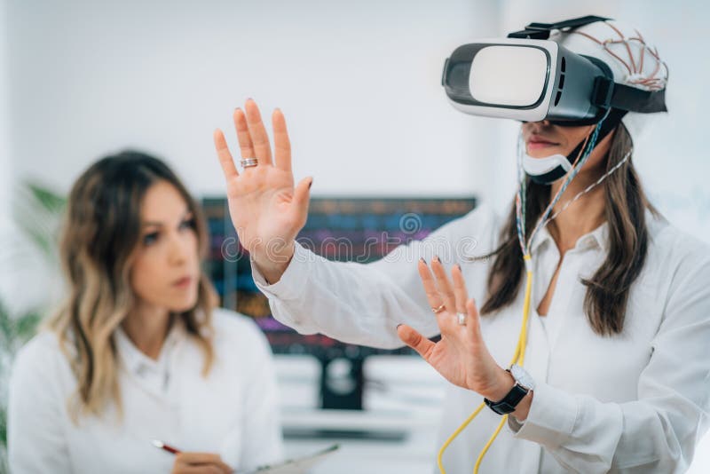 Brainwave EEG Experiment in Neuroscience Research Laboratory. Female ...