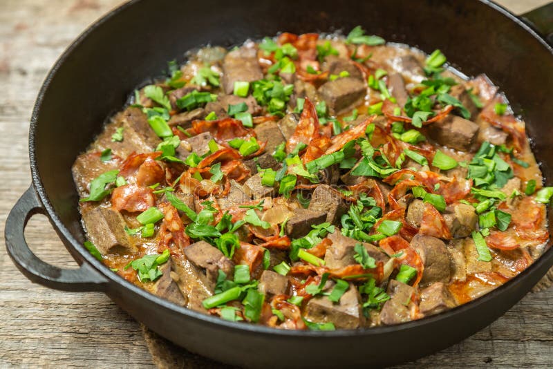 Braised Liver with Chorizo Sausage. Stock Photo - Image of rice ...