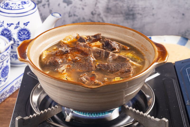 Braised mutton hot pot. stock image. Image of asian - 302286611