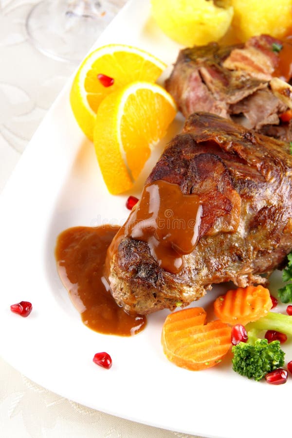 Braised Rabbit Meat with Vegetables and Potato Dumplings Stock Photo ...