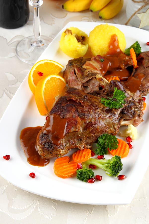 Braised Rabbit Meat with Vegetables and Potato Dumplings Stock Image ...