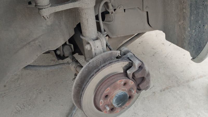 Brake Disc and Front Suspension of a Car with a Wheel Removed Stock ...