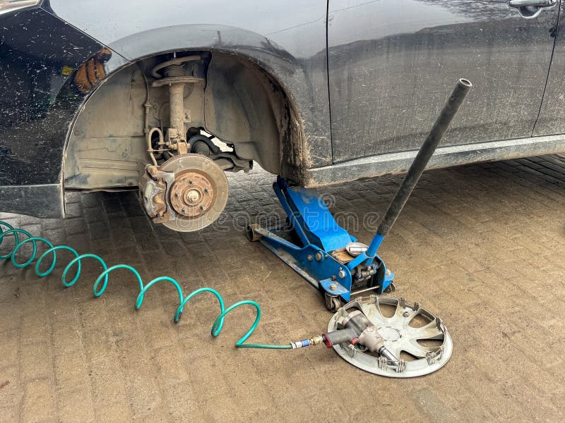 A Brake Disc on a Removed Car Wheel Stock Photo - Image of garage, disk ...
