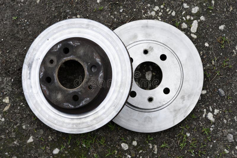 Brake Discs for the Car. New and Old Brake Disc Stock Photo - Image of ...