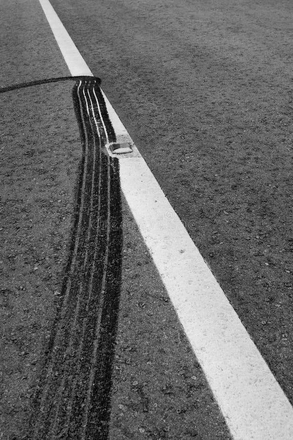 Brake Markings on a Tar Road Stock Image - Image of stripe, tyre: 8155169