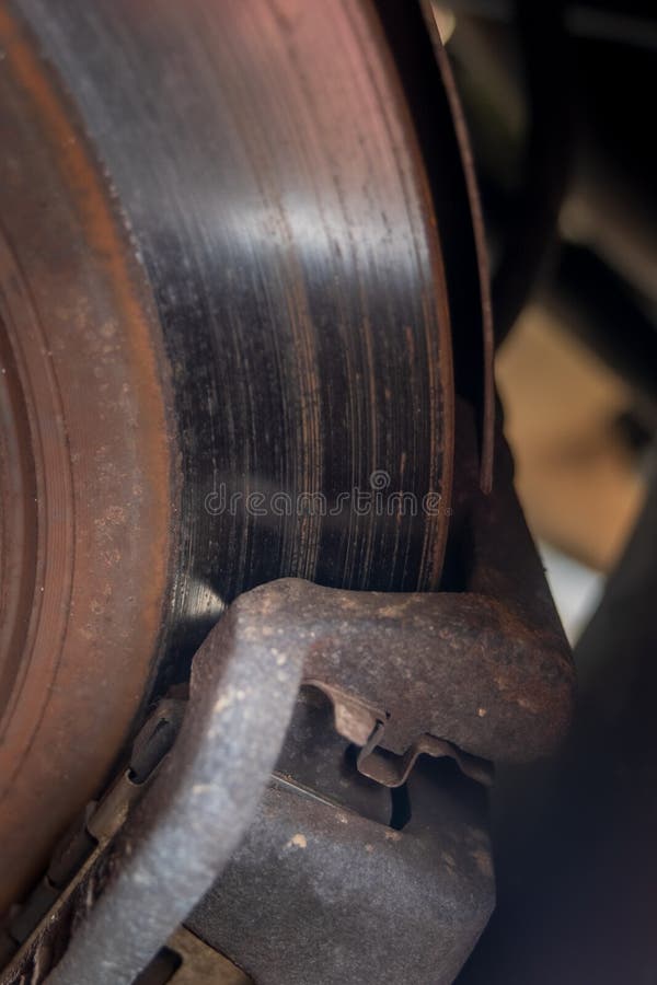 Brake Pad and Rusty Rotor on a Disc Brake Assembly Stock Photo - Image ...