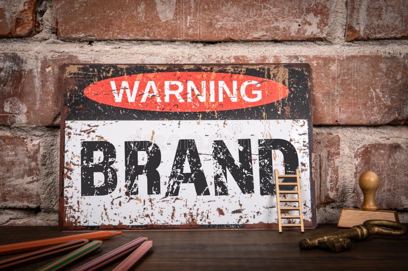 BRAND Concept. Warning Sign with Text on Wooden Shelf Stock Image ...