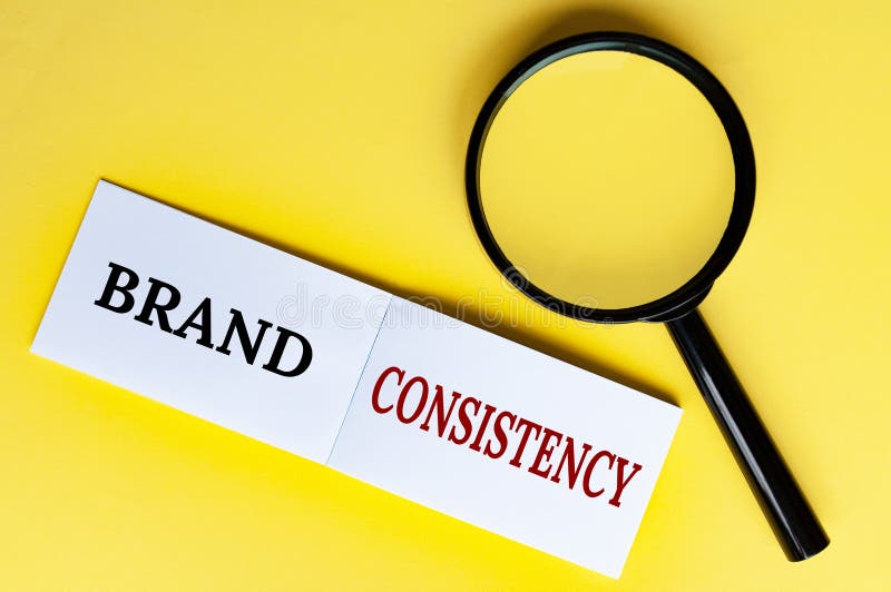 Brand Consistency Text on White Notepad with Magnifying Glass. Building ...