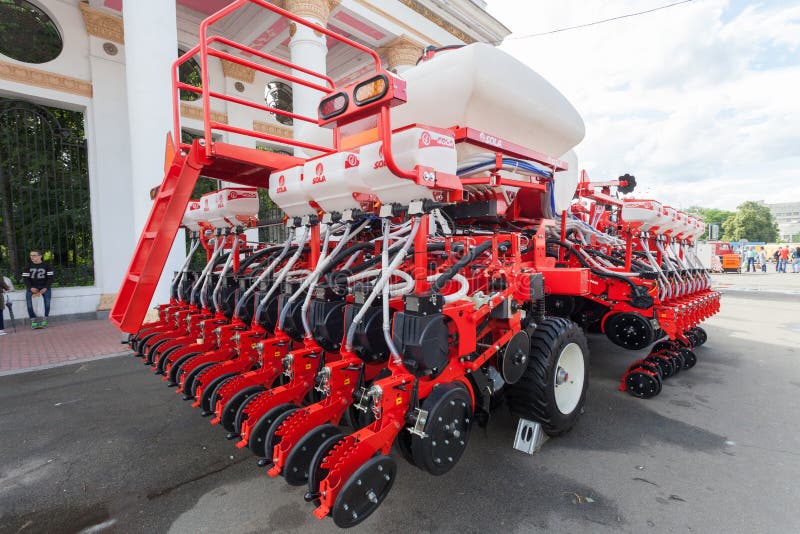 Brand New Red Agricultural Seeder. Editorial Photo - Image of seeder ...