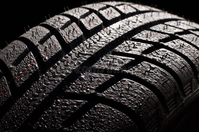 Brand New Winter Tire Pattern on Black Background Stock Photo - Image ...