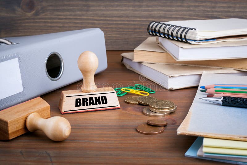 Brand. Rubber Stamp on Desk in the Office Stock Image - Image of ...