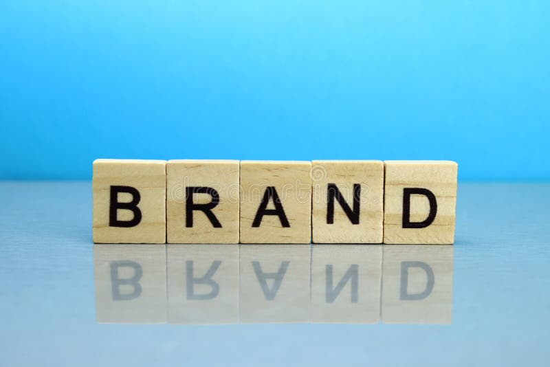 Brand Word Made of Wooden Blocks on a Blue Background Stock Image ...