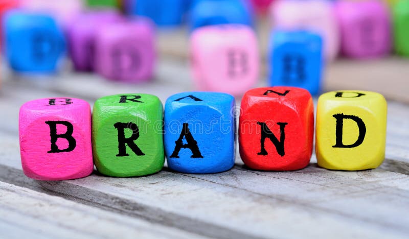 Brand word on wooden table stock image. Image of elementary - 81381565