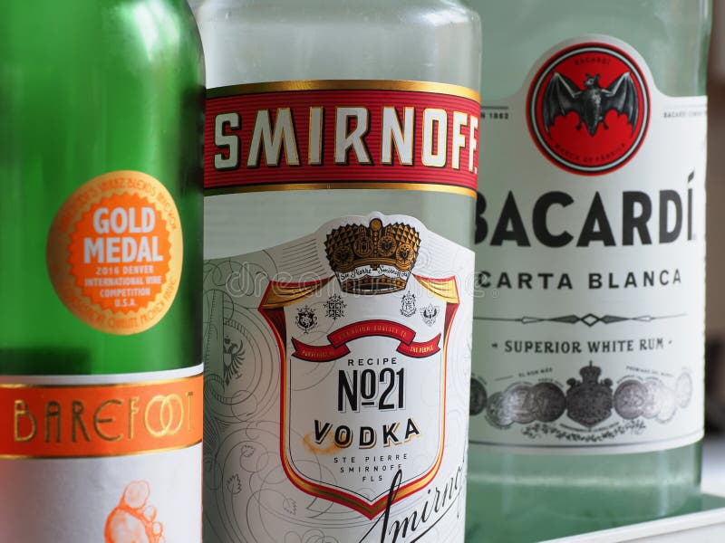 Bottles of Alcohol Vodka Rum and Red Wine Editorial Photo - Image of ...