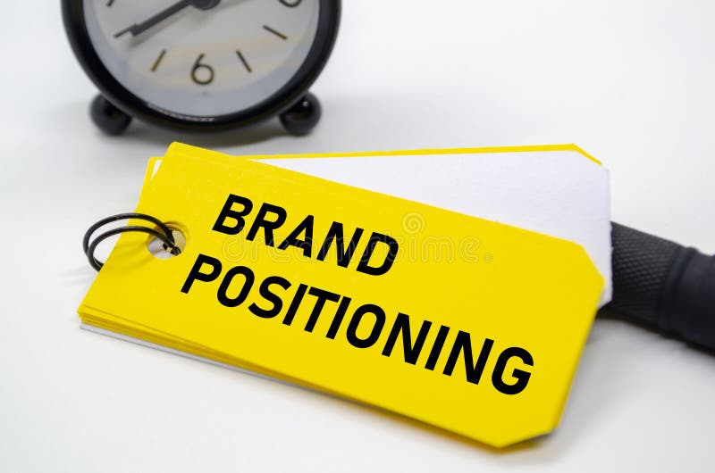 Branding Positioning Text in Bold Black Font on Yellow Sticky Note ...