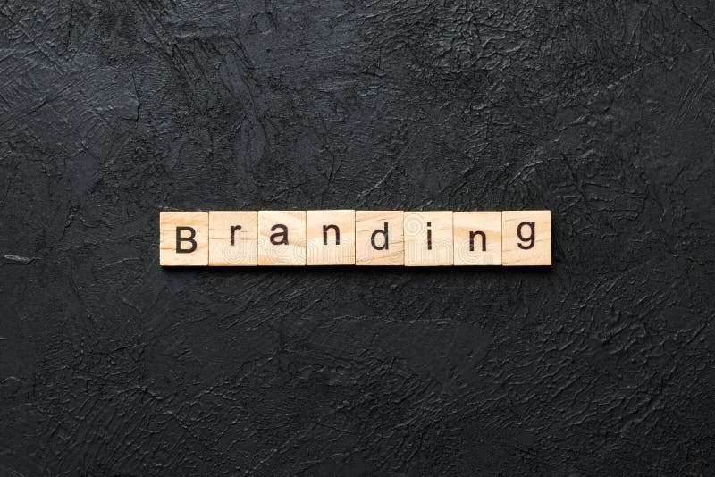 Branding Word Written on Wood Block. Branding Text on Table, Concept ...