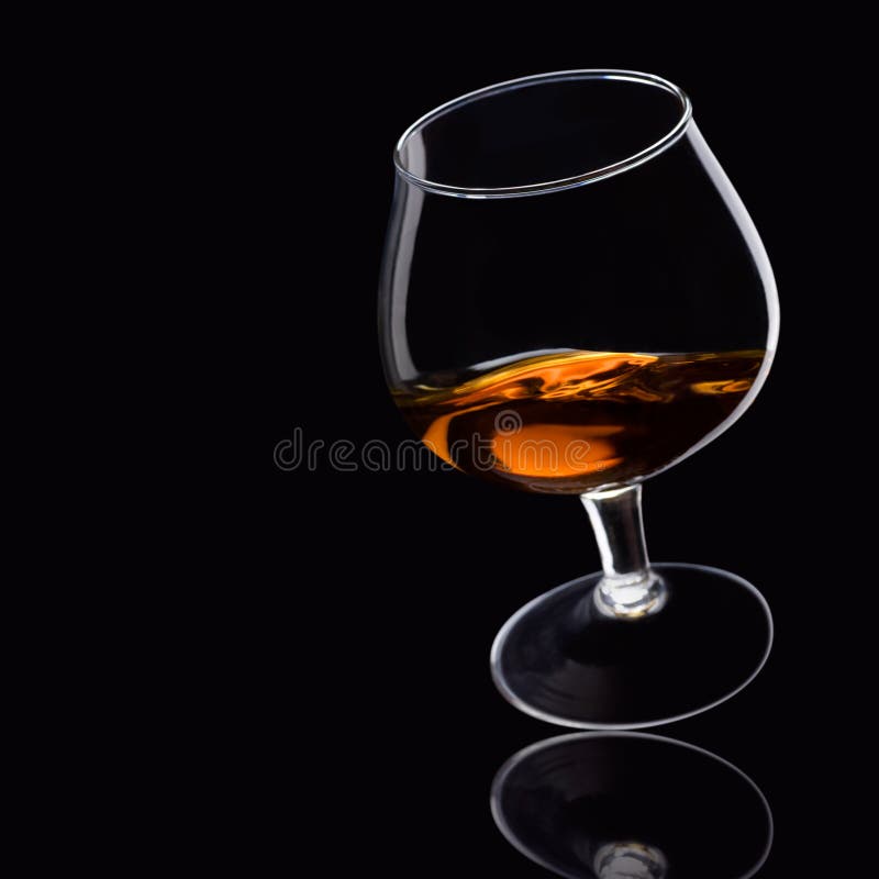 Glass of brandy stock photo. Image of texture, wood, board - 80205412