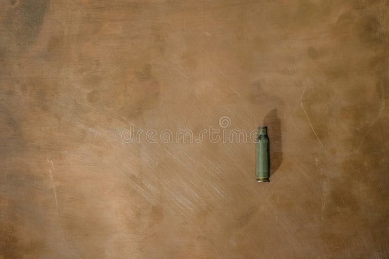 Brass Ammo Casing on the Copper Background. Stock Photo - Image of ...