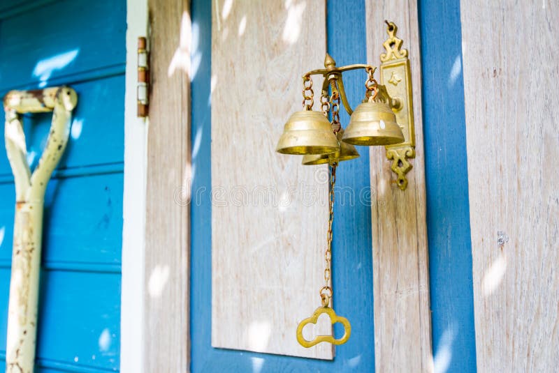 Brass bell on the door stock photo. Image of metal, house - 132211322
