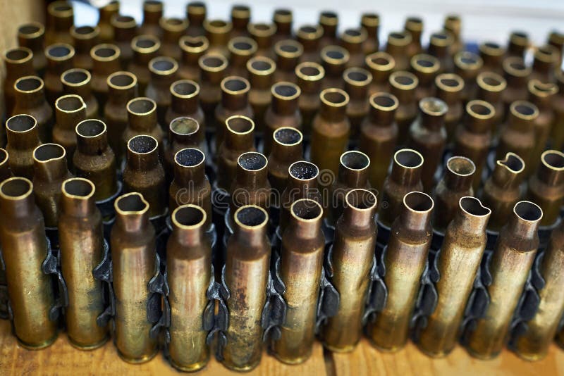 Brass Cases of Cartridges in Machine-gun Tape Stock Image - Image of ...