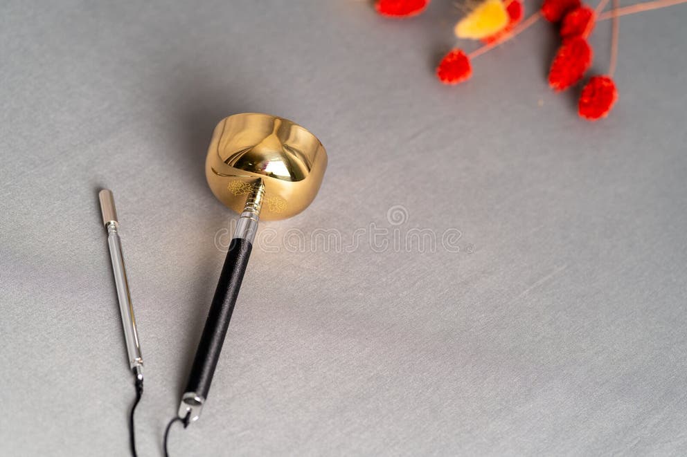 A Brass-Colored Extendable Buddhist Inverted Bell Stock Photo - Image ...