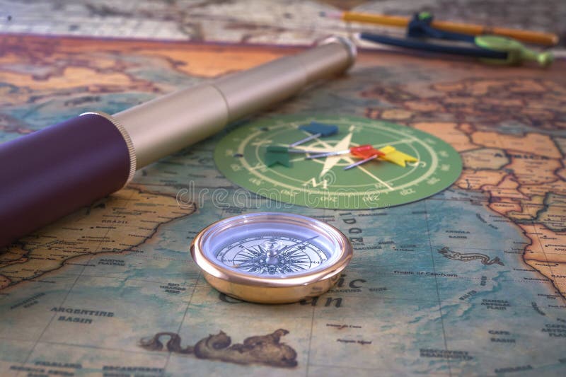 Brass Compass, a Spyglass, a Pencil with a Compass and Multi-colored ...