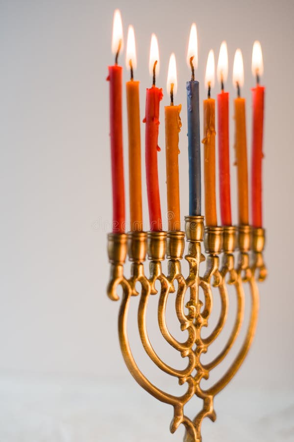 Brass Hanukiya with Lighted Candles Side View Stock Photo - Image of ...