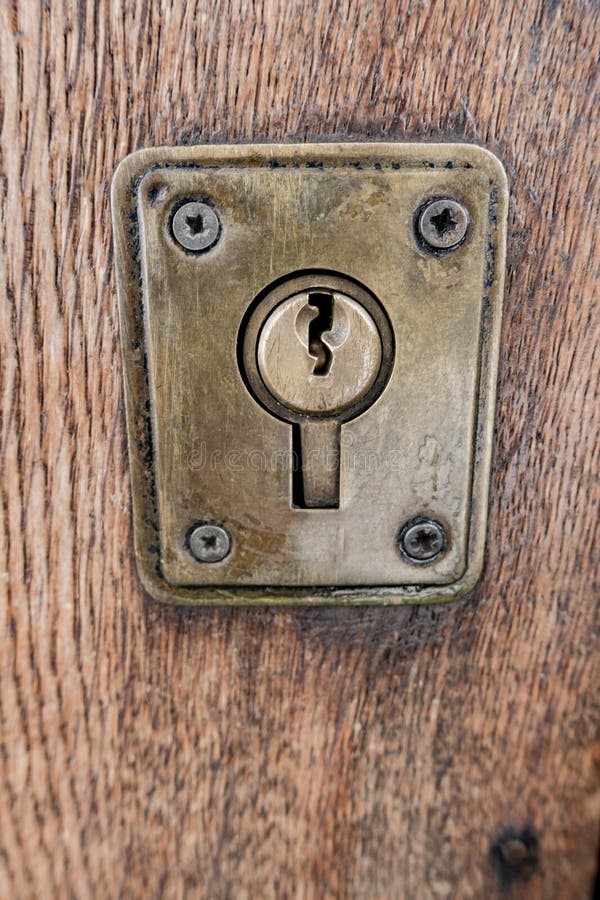 Brass lock on rustic wood stock image. Image of lock - 207485031