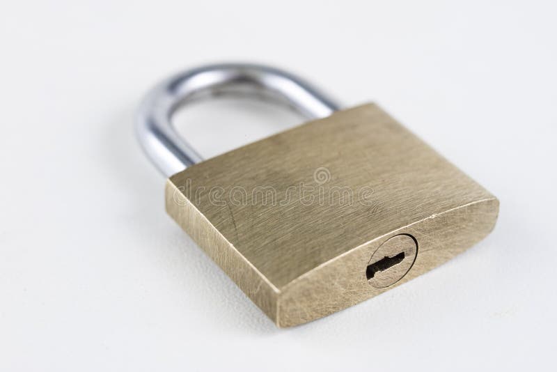 Brass Padlock on a White Table. Accessories for Locking and Securing ...