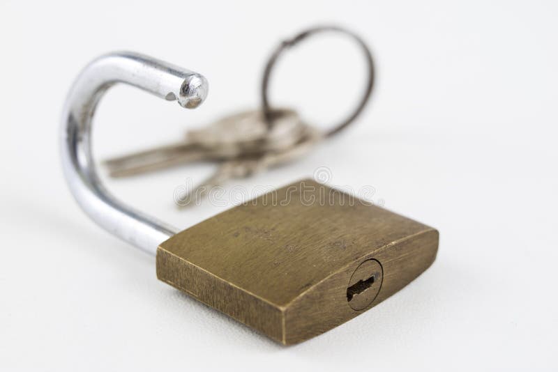 Brass Padlock on a White Table. Accessories for Locking and Securing ...