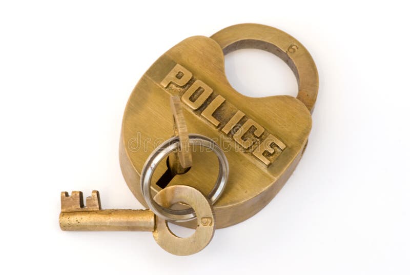 Brass Police Block with Key in Lock Stock Photo - Image of safe, locked ...