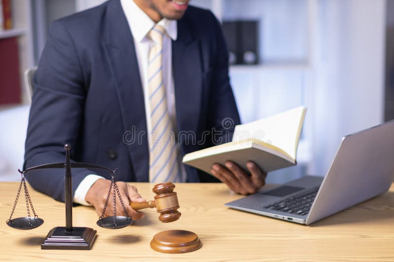 Brass Scales Are Placed On Lawyers Desks In Legal Advice Offices As A