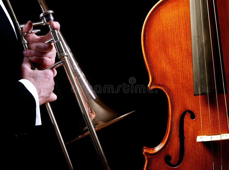 Brass and Stringed Instruments Stock Photo - Image of black, viola ...
