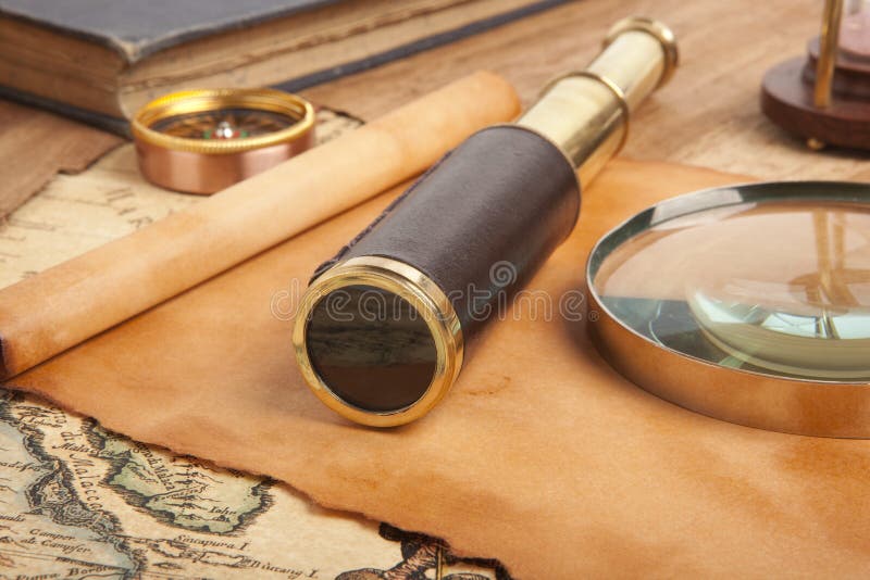 Brass telescope on map stock photo. Image of magnify - 29082564