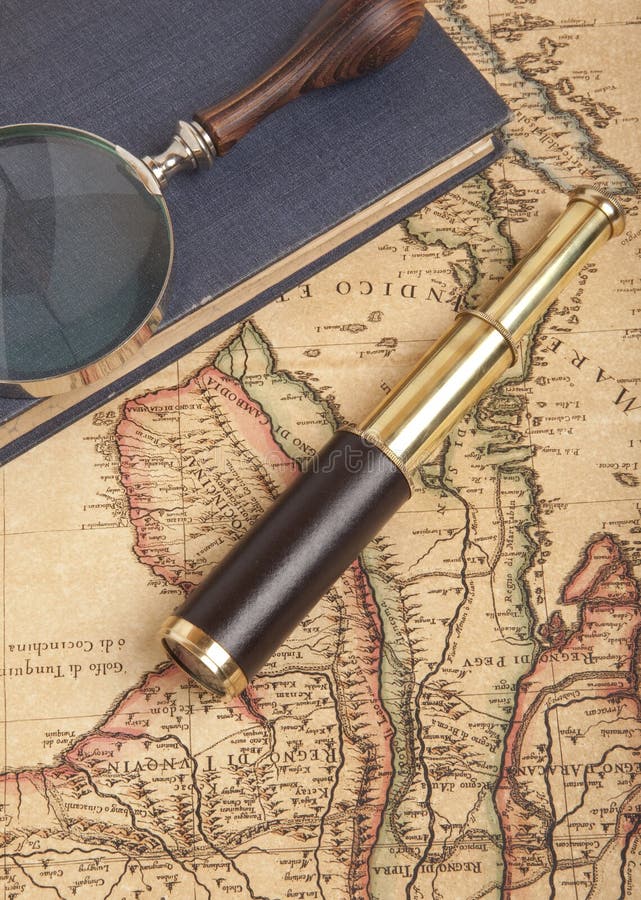 Brass telescope on map stock image. Image of orientation - 29200095