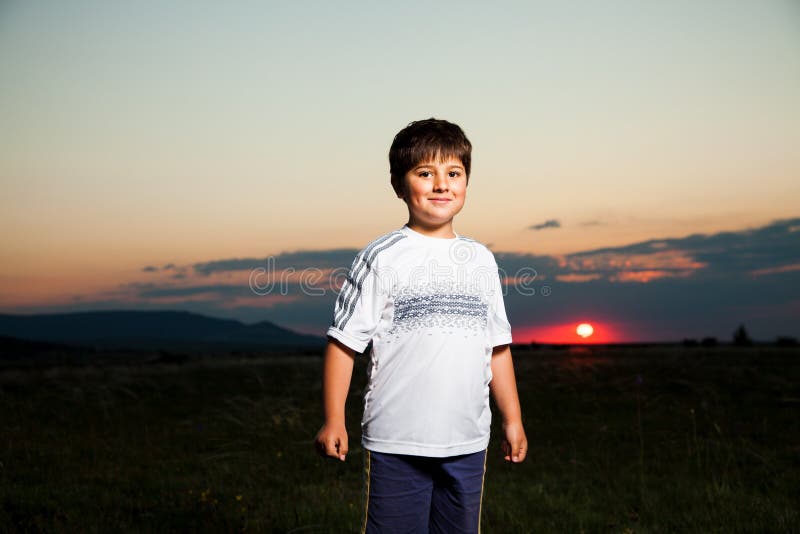 Brave Boy is Smiling Against the Dusk with Sun Stock Image - Image of ...