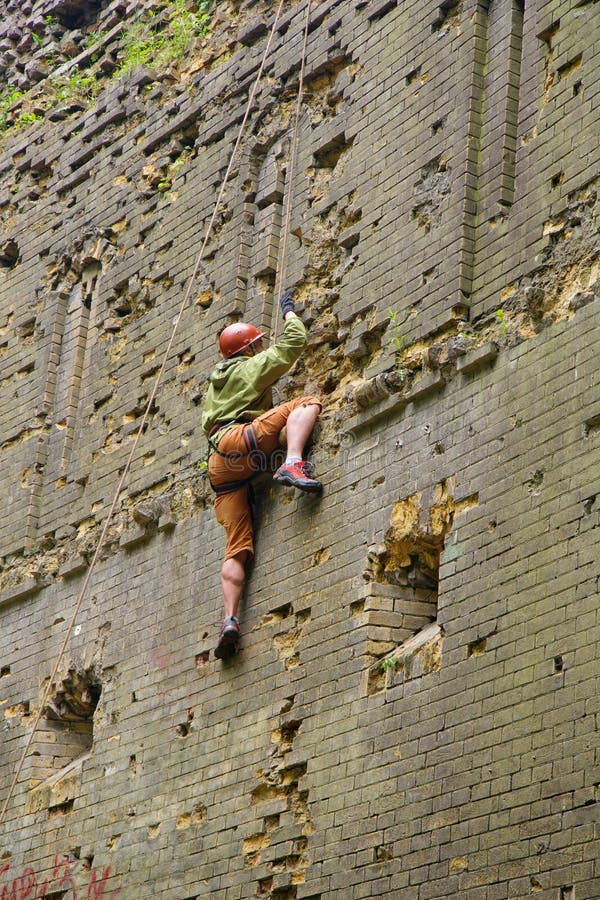 Brave climber climbing up stock photo. Image of grunge - 32969972