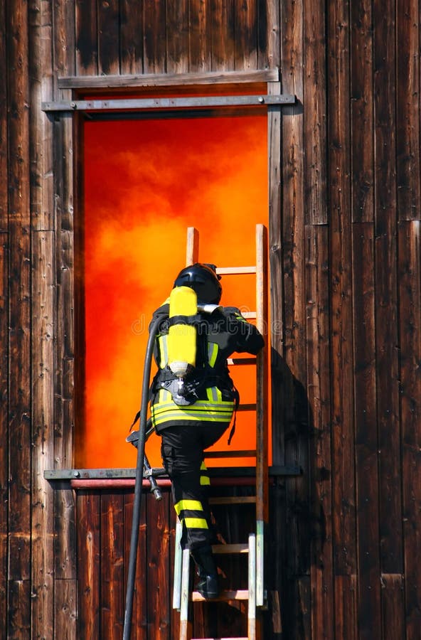 Brave Firefighter Enters through a Window with an Oxygen Tank during ...