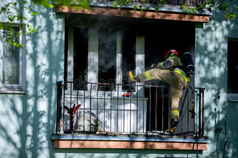A Brave Firefighter Performs a Daring Balcony Rescue during a Fire ...