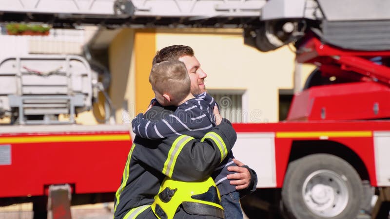 Brave Firefighter Fights Raging Wildfire with Water Spray on a Smoky ...