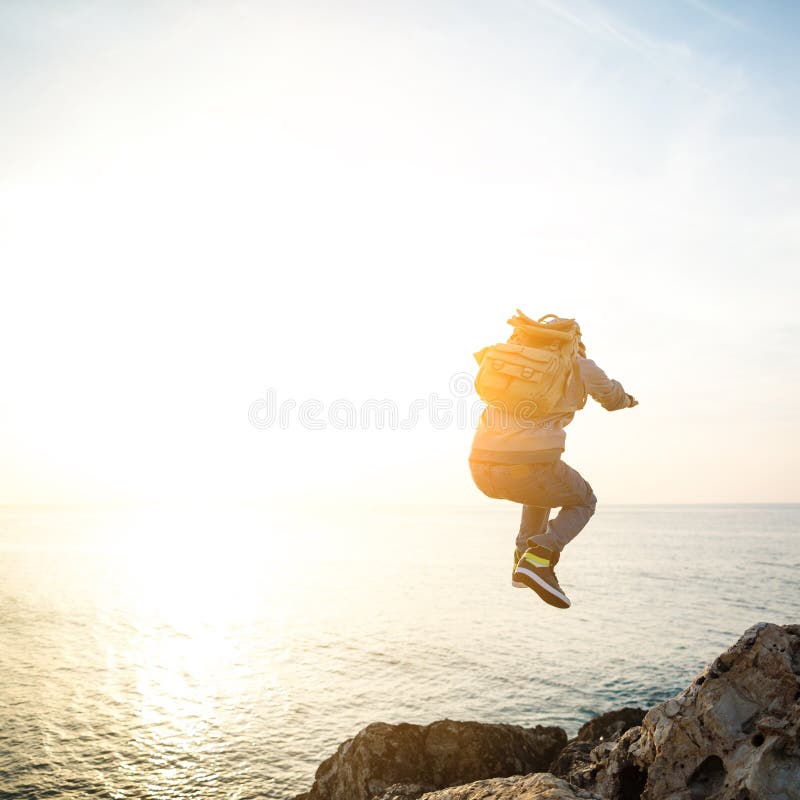 Brave Man Jumping Over the Cliff in Canyon Stock Image - Image of brave ...