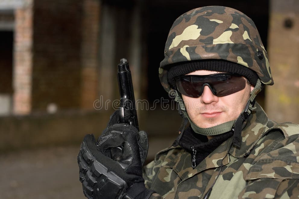 Brave man with a gun stock photo. Image of brick, airsoft - 24005532