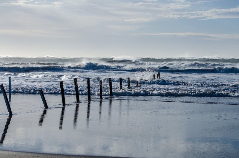 Brave sea in the beach stock photo. Image of sunrise - 190909452