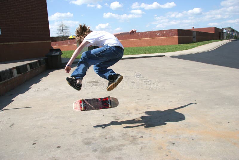 Brave Skateboarder Doing 360 Flip Stock Photo - Image of boys, danger ...