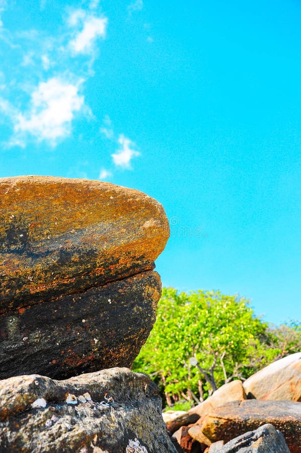 Brawn rock and blue sky stock image. Image of pastry - 138877183